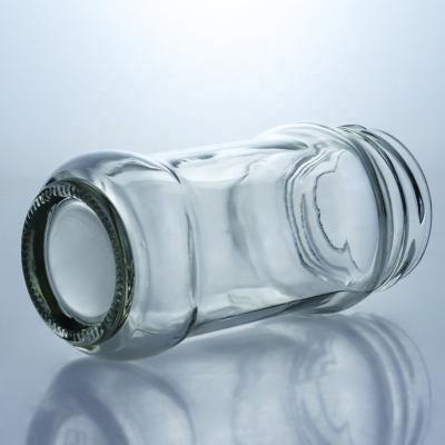 Cina Bottone di contenimento di marmellata di miele in vetro trasparente con coperchio a sigillo metallico da 25 ml a 1000 ml in vendita