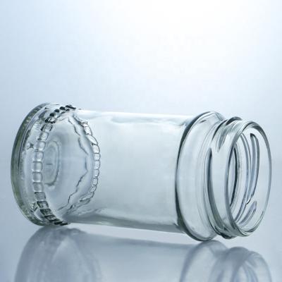 Cina Disegno unico 100ml 300ml 500ml Country Honey Glass Jar con coperchio Prodotti in vetro trasparente in vendita