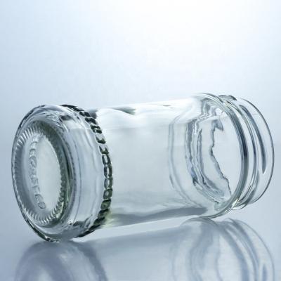 Cina Disegno unico 100ml 300ml 500ml Country Honey Glass Jar con coperchio Prodotti in vetro trasparente in vendita
