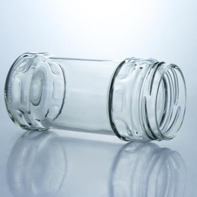Cina Prodotto in vetro rotondo trasparente di qualità alimentare con vaso di miele a vite per le vostre esigenze uniche in vendita