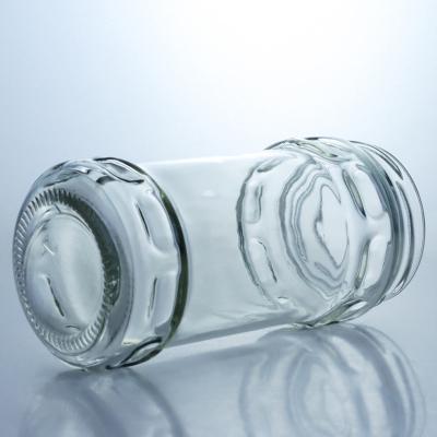 Cina Prodotto in vetro rotondo trasparente di qualità alimentare con vaso di miele a vite per le vostre esigenze uniche in vendita