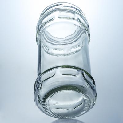 Cina Prodotto in vetro rotondo trasparente di qualità alimentare con vaso di miele a vite per le vostre esigenze uniche in vendita