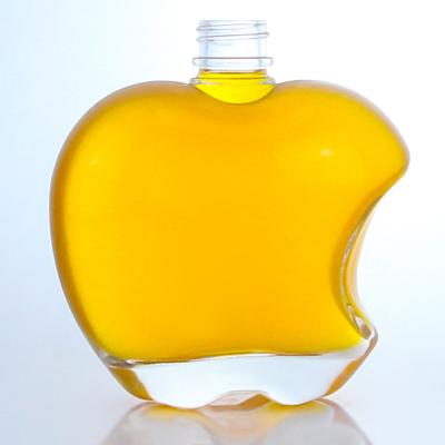 Cina Bottiglia in vetro a forma di mela con tappo personalizzato per vodka tequila whisky in vetro Super Flint in vendita