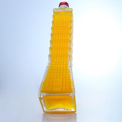 Cina Bottiglia di vetro a forma di torre per vodka brandy tequila logo personalizzato in vendita