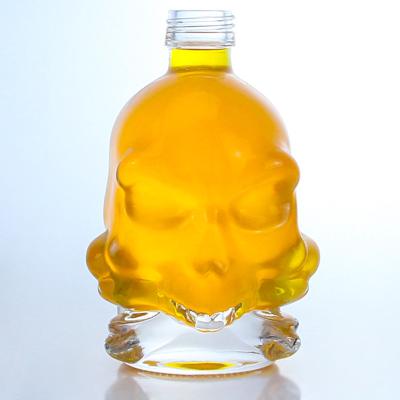 Cina Decal superficie forma cranio bottiglia di liquore di vetro per il whisky vodka Brandy tecnica di invecchiamento in vendita