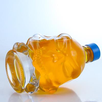 Cina Decal superficie forma cranio bottiglia di liquore di vetro per il whisky vodka Brandy tecnica di invecchiamento in vendita
