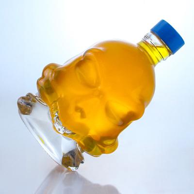 Cina Decal superficie forma cranio bottiglia di liquore di vetro per il whisky vodka Brandy tecnica di invecchiamento in vendita