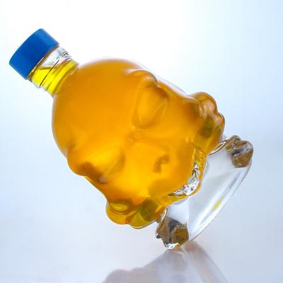 Cina Decal superficie forma cranio bottiglia di liquore di vetro per il whisky vodka Brandy tecnica di invecchiamento in vendita