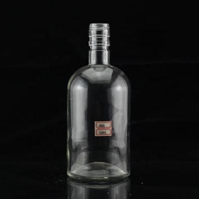 Cina Bottiglia di vetro industriale da 700 ml per l'industria delle bevande a forma di pollice in vendita