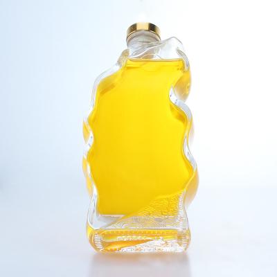 Cina Bottiglia di vetro a forma speciale trasparente o personalizzata per whisky vodka brandy in vendita