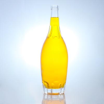 Cina Personalizzazione Bottiglia di liquore a forma rotonda con disegno in rilievo e tappo di sughero personalizzato in vendita