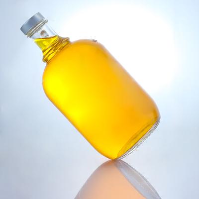 Cina Logo personalizzato Bottiglia di vetro di liquore a forma rotonda con manico e tappo a vite in vendita