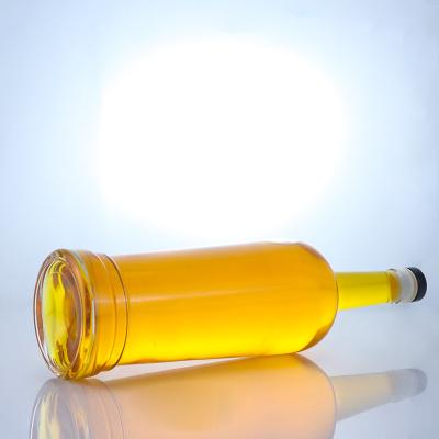 Cina Base di vetro Forma rotonda Logo personalizzabile Collo lungo Bottiglia di liquore con sughero in vendita