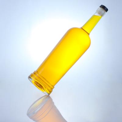 Cina Base di vetro Forma rotonda Logo personalizzabile Collo lungo Bottiglia di liquore con sughero in vendita