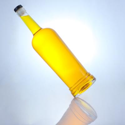 Cina Base di vetro Forma rotonda Logo personalizzabile Collo lungo Bottiglia di liquore con sughero in vendita