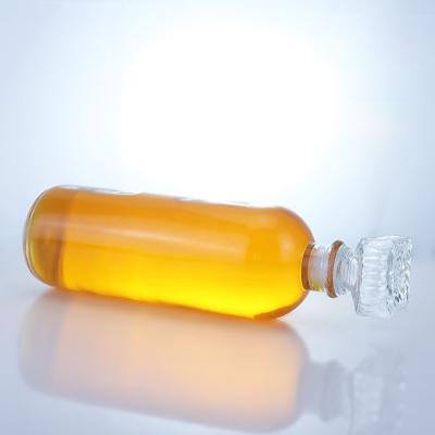 Cina Bottiglia di vetro a forma rotonda per rum, vodka, whisky, tequila e gin in vendita