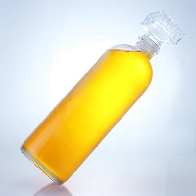 Cina Bottiglia di vetro a forma rotonda per rum, vodka, whisky, tequila e gin in vendita