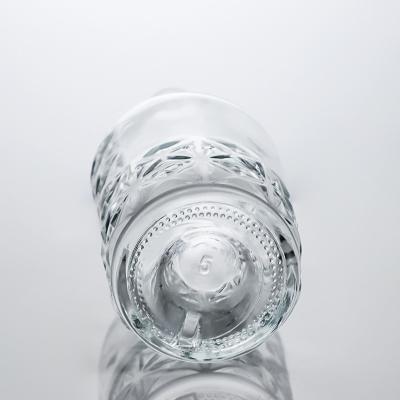 Cina Bottiglia speciale di liquore in vetro in rilievo per rum gin vodka chiara o personalizzata in vendita