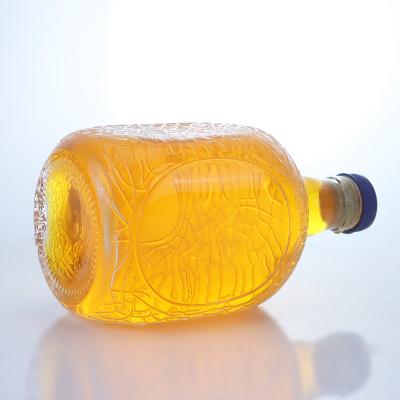Cina Unica forma rotonda in rilievo rum di qualità alimentare vodka whisky tequila gin bottiglia di vetro con sughero perfetto in vendita