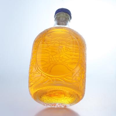 Cina Unica forma rotonda in rilievo rum di qualità alimentare vodka whisky tequila gin bottiglia di vetro con sughero perfetto in vendita