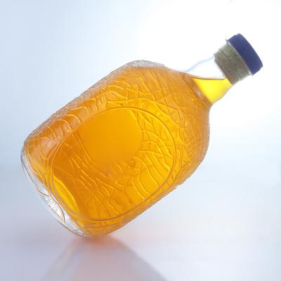 Cina Unica forma rotonda in rilievo rum di qualità alimentare vodka whisky tequila gin bottiglia di vetro con sughero perfetto in vendita
