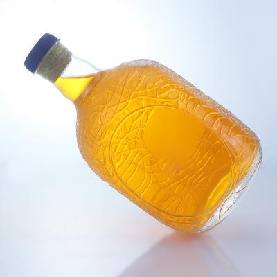 Cina Unica forma rotonda in rilievo rum di qualità alimentare vodka whisky tequila gin bottiglia di vetro con sughero perfetto in vendita