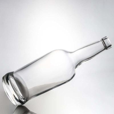 Cina Collare in vetro con logo personalizzato Bottiglia rotonda di liquori da 700 ml per vodka brandy whisky e altro in vendita