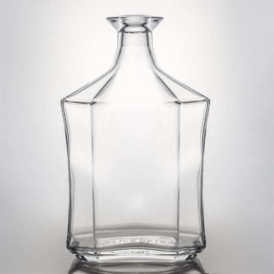 Cina 500 ml 700 ml 750 ml Bottiglia di liquore a pietra chiara con tappo e tappo di sughero personalizzato in vendita