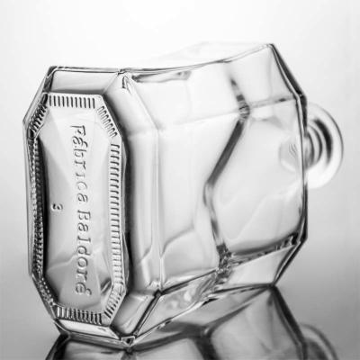 Cina Bottiglia di liquore in vetro poligonale unica e trasparente o personalizzata per whisky gin rum vodka 1000 ml in vendita