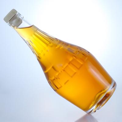 中国 シャンパン用700ml 豪華なデザインの 透明な石灰色のガラスボトル 独特の形と空っぽ 販売のため