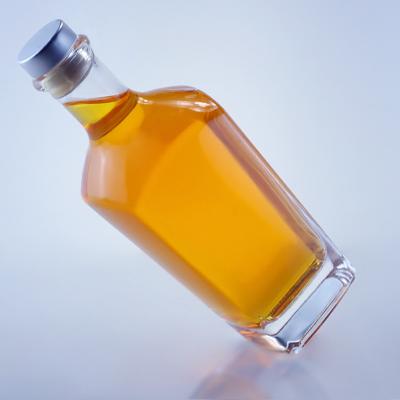 Cina Colore della bottiglia Chiara bottiglia di vetro a forma unica da 750 ml per gin rum champagne brandy whisky in vendita