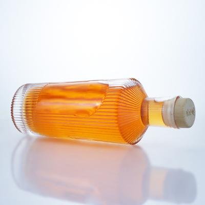 Cina Bottiglia in vetro di pietra di design unico da 700 ml per gin rum champagne brandy whisky liquore in vendita
