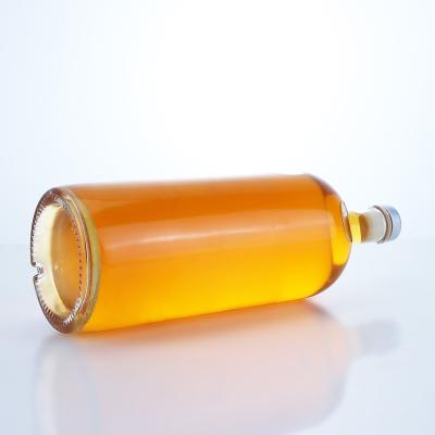 Cina Tequila Vodka Rum Whisky Liquor Bottiglia di vetro con sughero 1000 ml in forma di cilindro di pietra alta in vendita