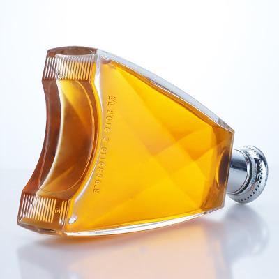 Cina Materiale del corpo Vetro 700 ml Bottiglia di pietra trasparente per Gin Rum Champagne Whisky in vendita
