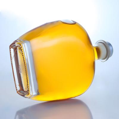China Clear Round Shape Glass Bottle for Gin Rum Champagne Brandy Whisky 700ml for sale