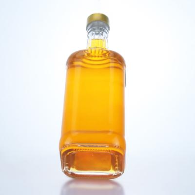 China Whisky Collar Material Glass 750ml Liquor Glass Bottle with Unique Shape and Cork for sale