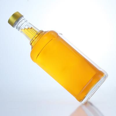 China Whisky Collar Material Glass 750ml Liquor Glass Bottle with Unique Shape and Cork for sale