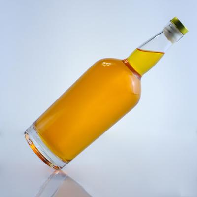 China Customized Logo 750ml Clear Flint Round Glass Bottle for Gin Rum Champagne Liquor for sale