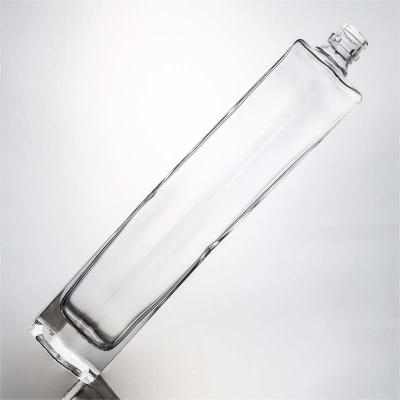 China Brandy Champagne Gin Tequila Glass Bottle 700ml with Cork Cap and Customized Logo for sale