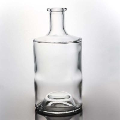 Cina Bottiglia di vetro di 750 ml a forma rotonda con sughero di legno per il whisky in vendita