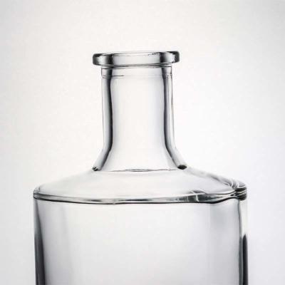 Cina Bottiglia di vetro di 750 ml a forma rotonda con sughero di legno per il whisky in vendita