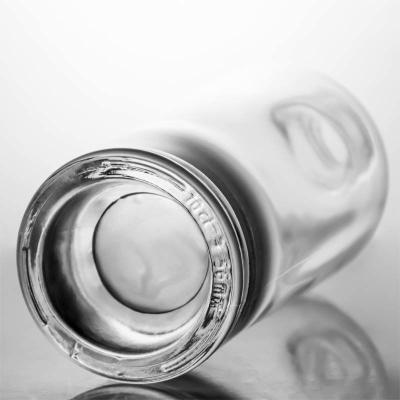 Cina Logo personalizzato 700ml 1000ml Clear Flint Gin Rum Champagne Liquor Bottiglia di vetro con sughero in vendita