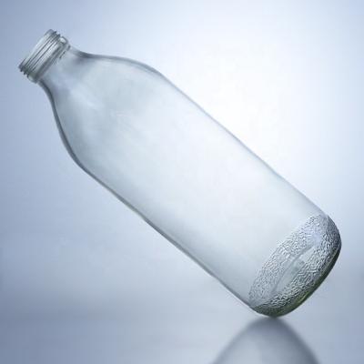 Cina Bottiglie di vetro trasparenti da 1020 ml con tappo a vite e forma unica in vendita