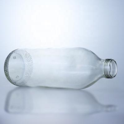 Cina Bottiglie di vetro trasparenti da 1020 ml con tappo a vite e forma unica in vendita