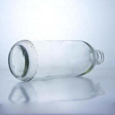 Cina Bottiglie di vetro trasparenti da 1020 ml con tappo a vite e forma unica in vendita