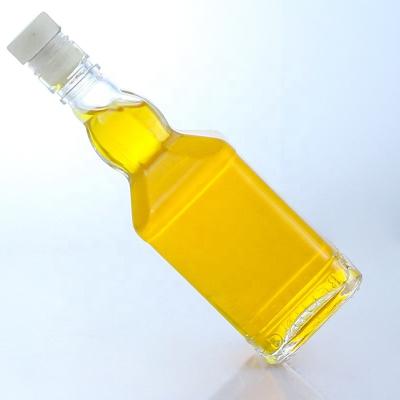 Cina 350 ml 500 ml tappo a vite bottiglia trasparente in vetro di pietra per whisky vodka champagne tequila gin rum in vendita