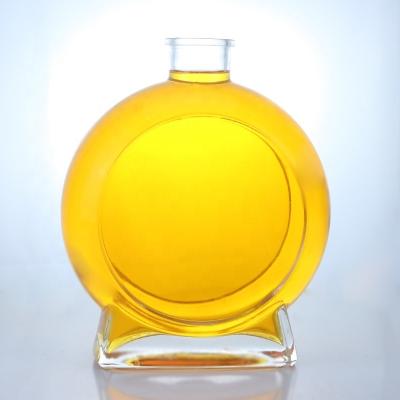 Cina Bottiglia di vetro vuota a tenuta di sughero a fondo spessa per gin whisky rum tequila brandy in vendita