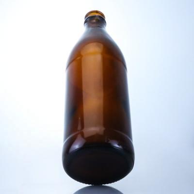 Cina Bottine di vetro vuote con tappi a corona da 700 ml 750 ml Bottella di ambra creativa piccola in vendita