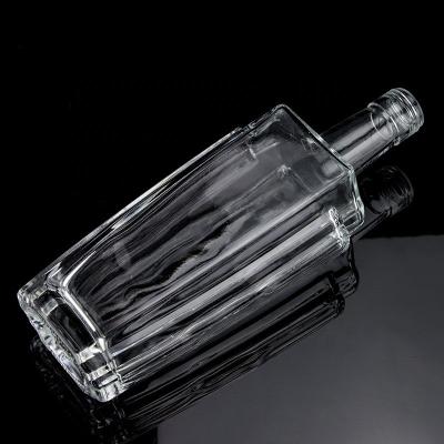 Cina 500 ml 700 ml 750 ml Bottiglia di vetro di pietra per champagne Gin Rum trasparente e in rilievo in vendita