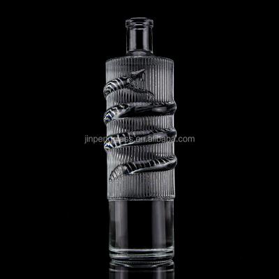 Cina Bottiglia di vetro in rilievo di lusso 750ml 1000ml Gin Rum Champagne Tequila Whisky con sughero in vendita